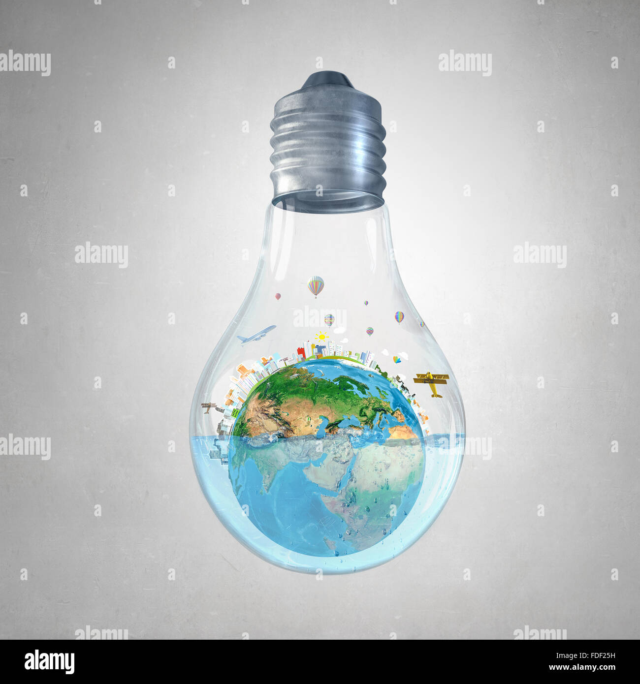 Glass light bulb filled with water and floating Earth planet. Elements ...