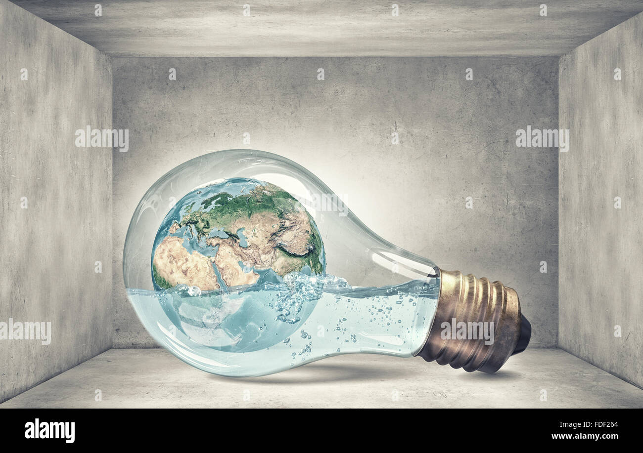 Glass light bulb filled with water and floating Earth planet. Elements ...