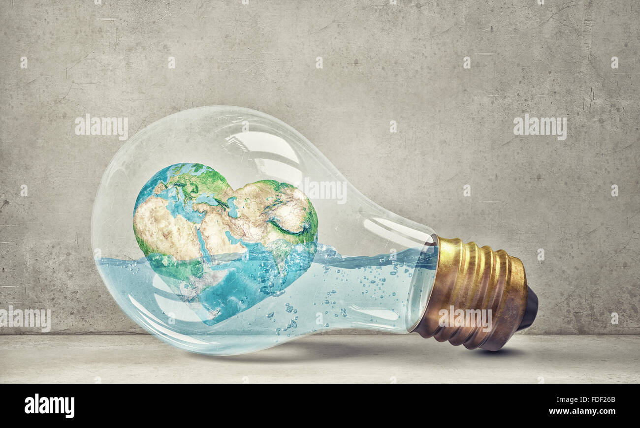 Glass light bulb filled with water and floating Earth planet. Elements ...