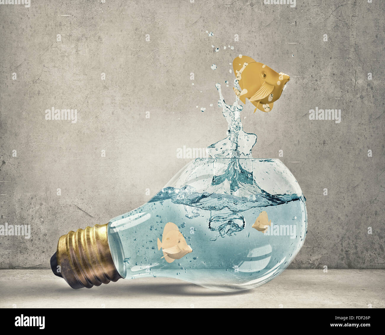 Exotic fish in water inside electric light bulb Stock Photo - Alamy