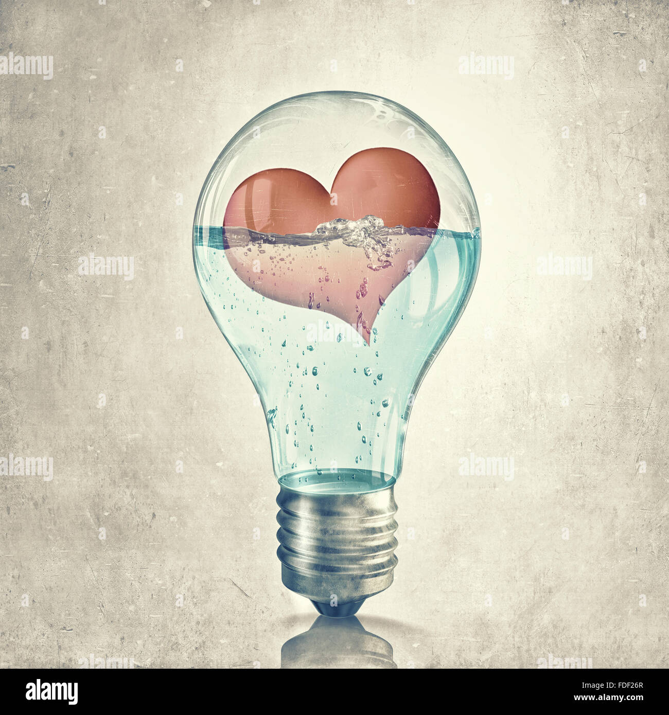 Glowing light bulb and red heart inside of it Stock Photo - Alamy