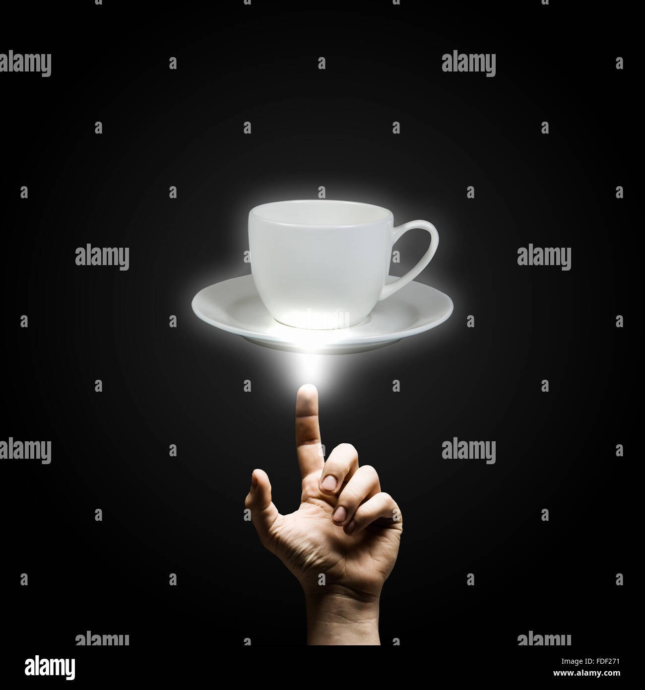 Human hand pointing with finger at cup of coffee Stock Photo - Alamy