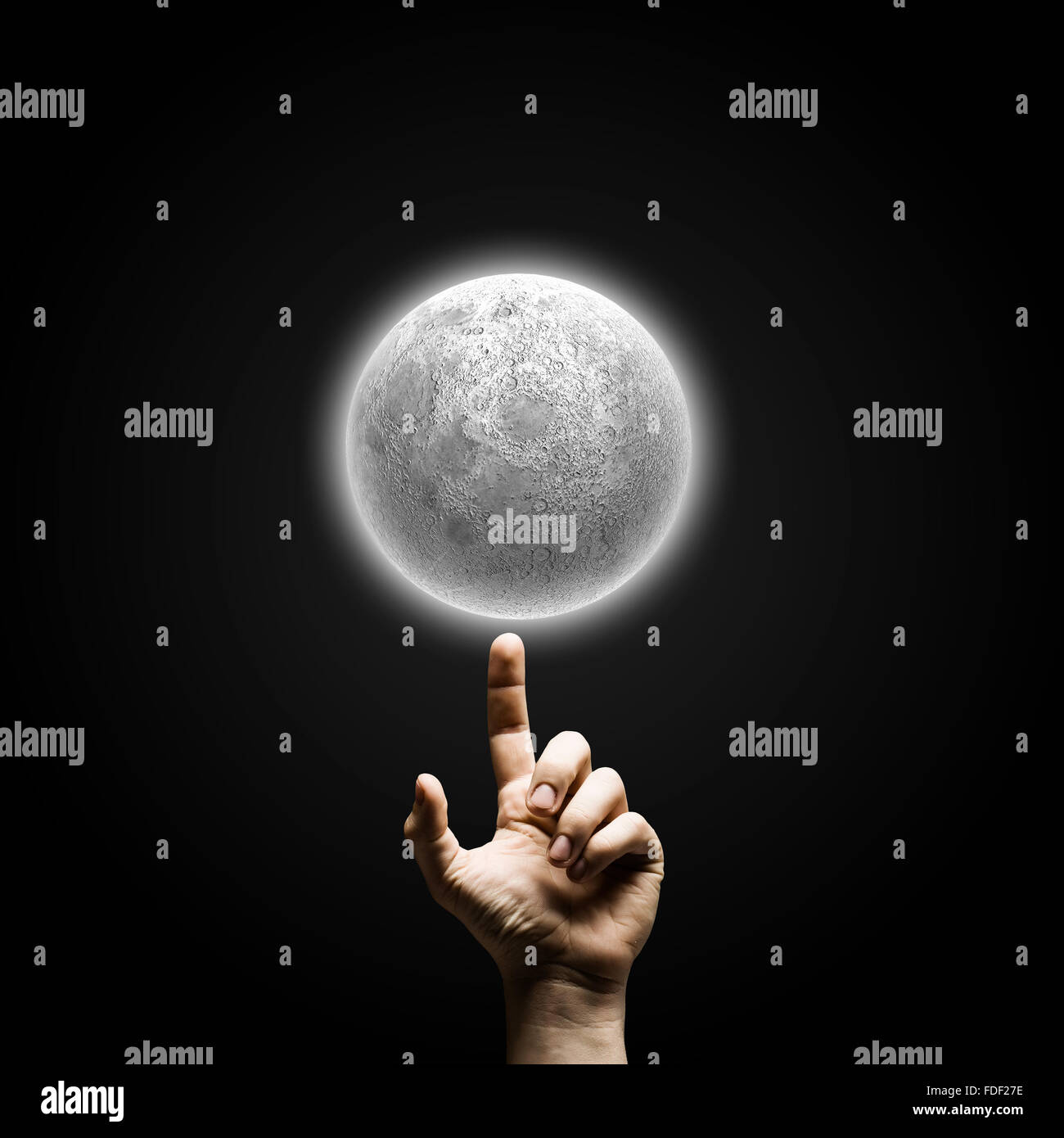 Man's hand pointing at moon with finger Stock Photo - Alamy