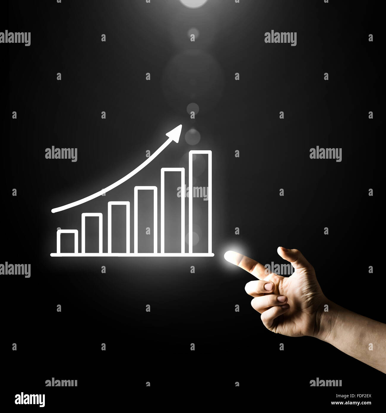 Human hand pointing with finger at growing graph Stock Photo - Alamy