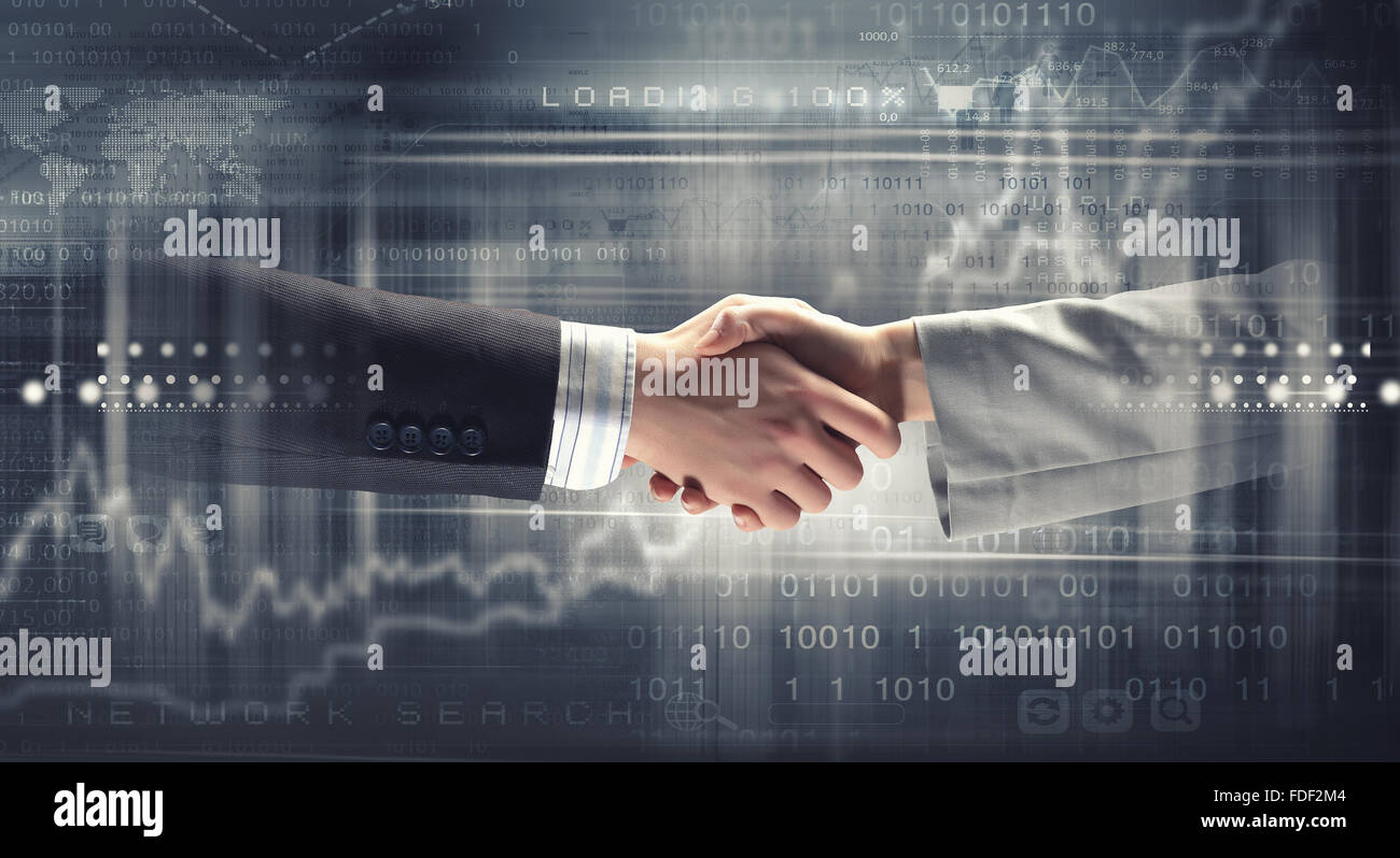 Close up of business handshake on digital background Stock Photo - Alamy
