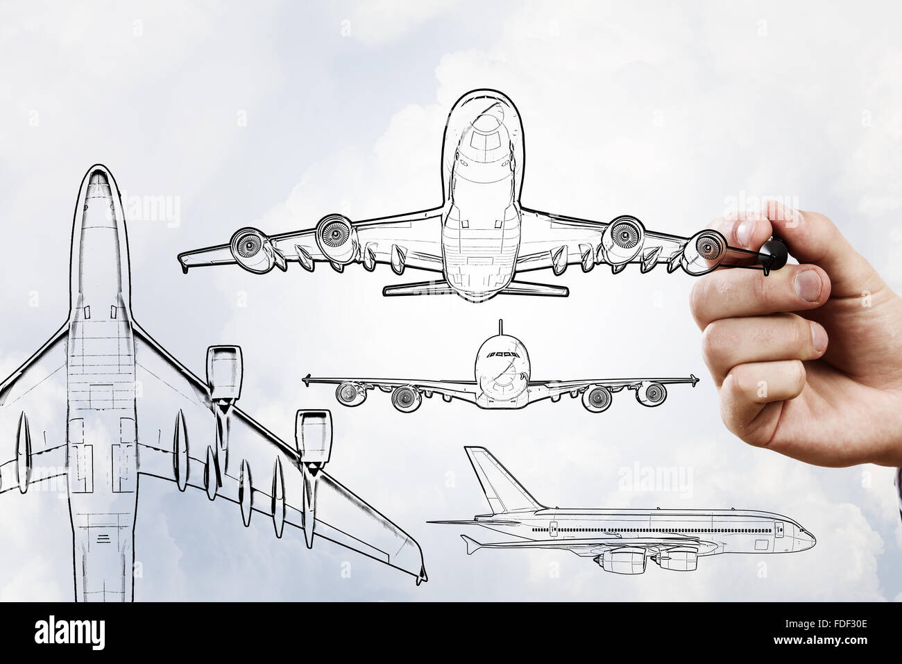 Person drawing airplane model on sky background Stock Photo - Alamy