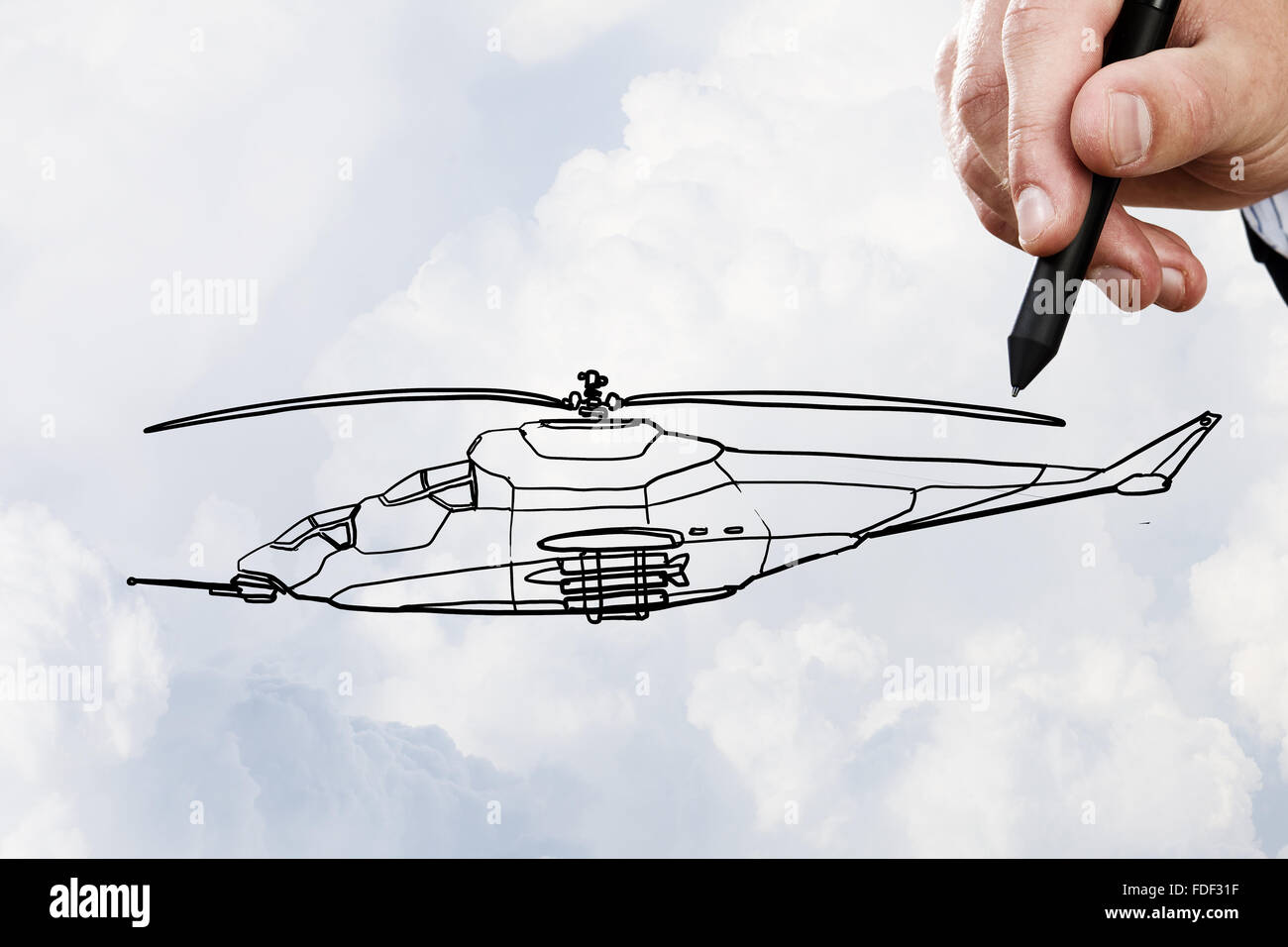 Person hand drawing helicopter model ob sky background Stock Photo - Alamy