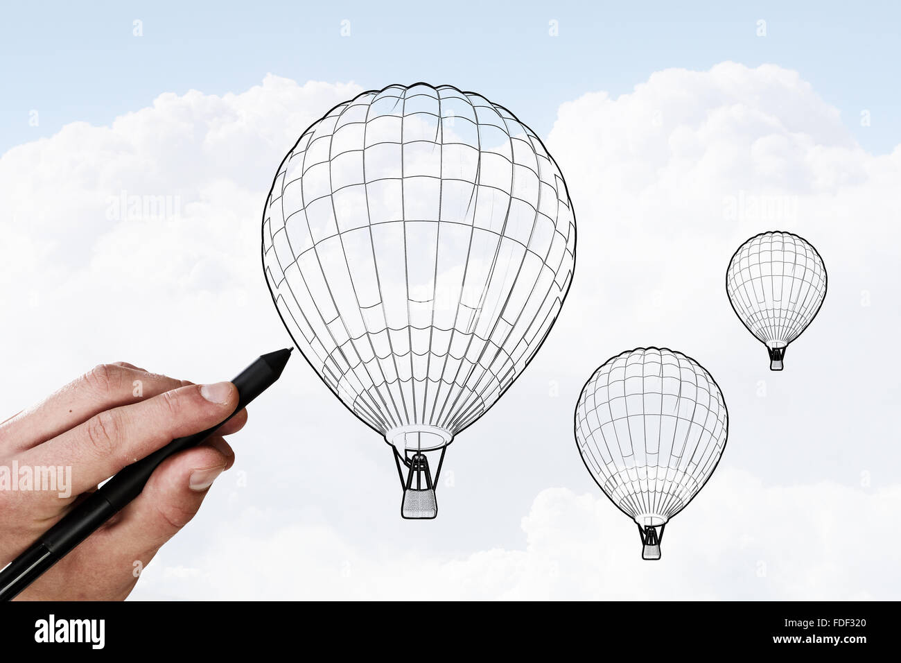 Person hand drawing aerostat on sky background Stock Photo - Alamy