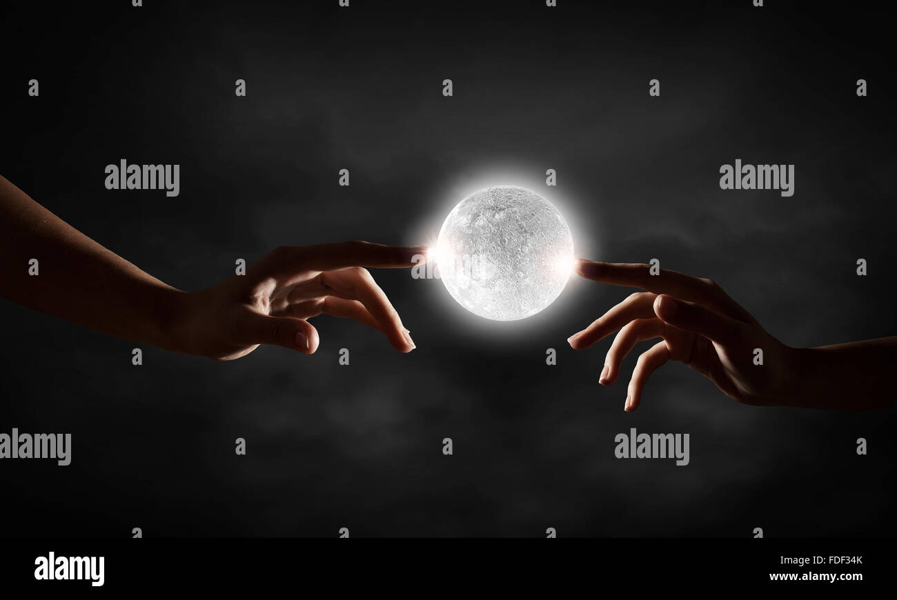 Touching the moon hi-res stock photography and images - Alamy