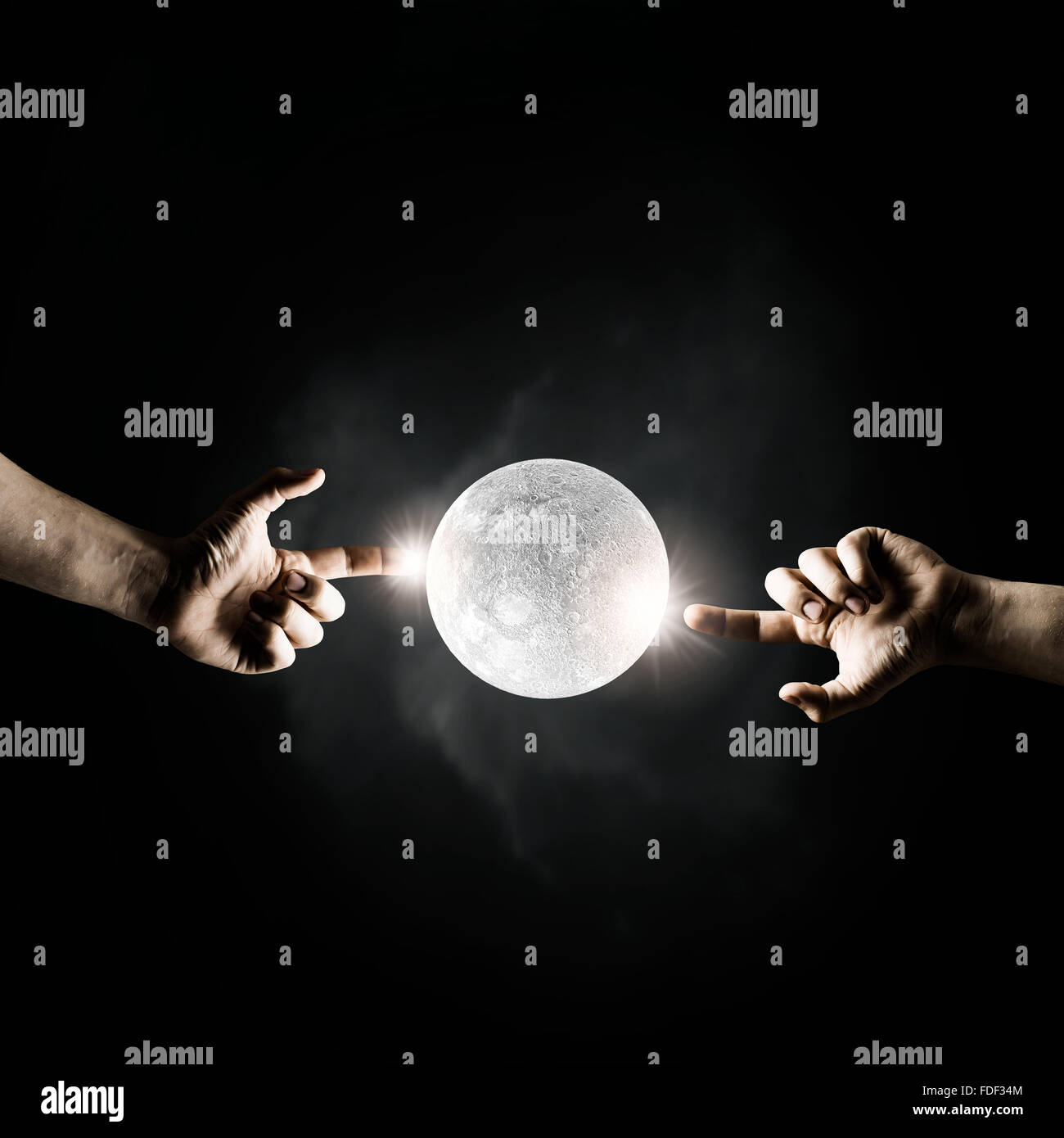 Close up of human hands touching with fingers and moon planet Stock ...