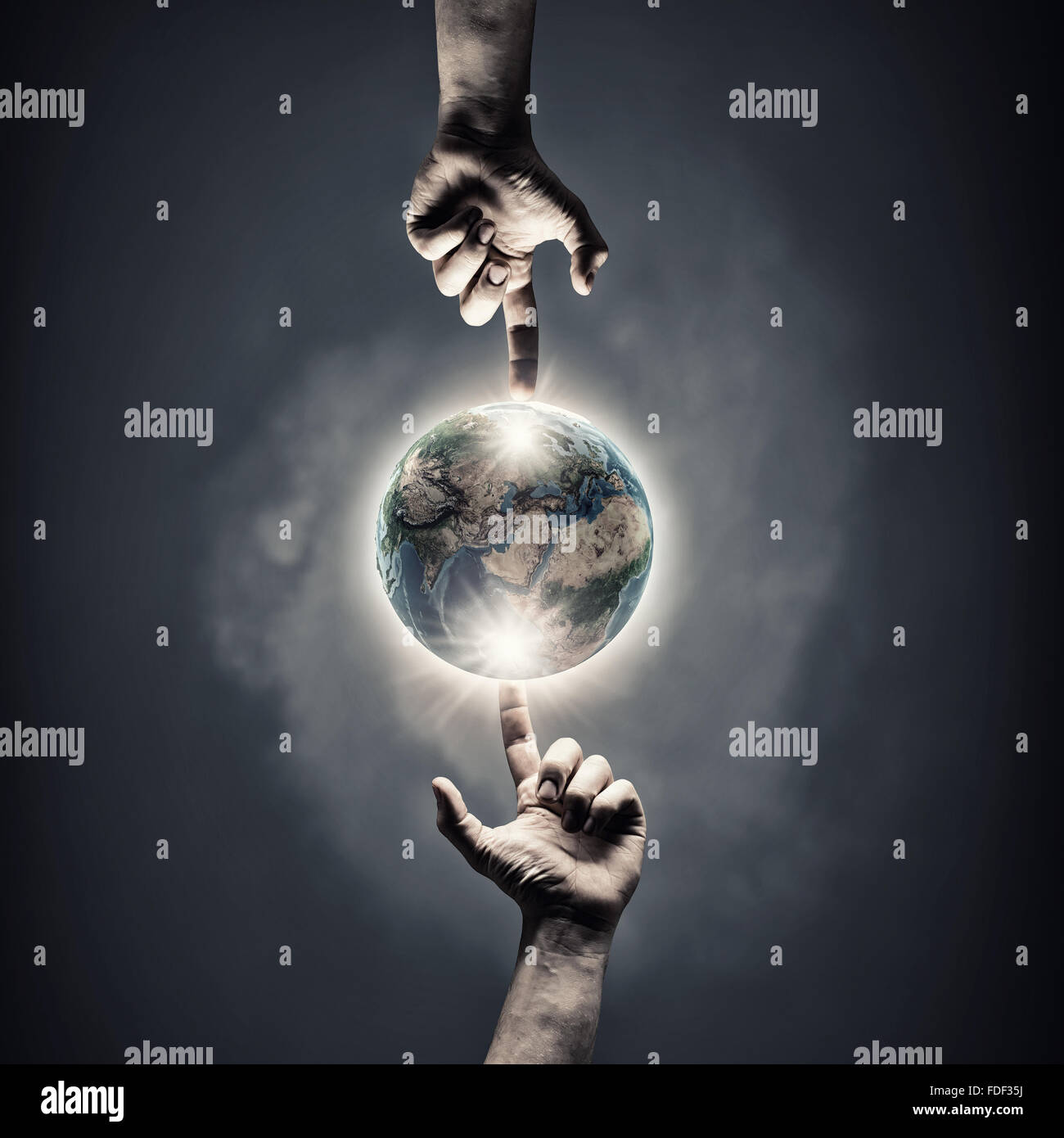 Hand gesture of earth touching hi-res stock photography and images - Alamy