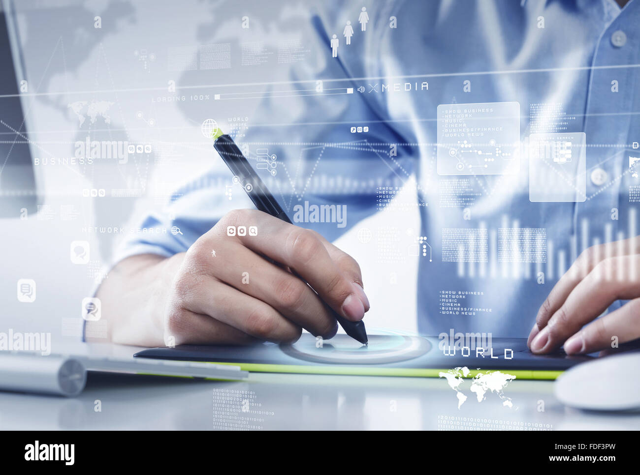 Graphic designer drawing something on tablet at office Stock Photo - Alamy