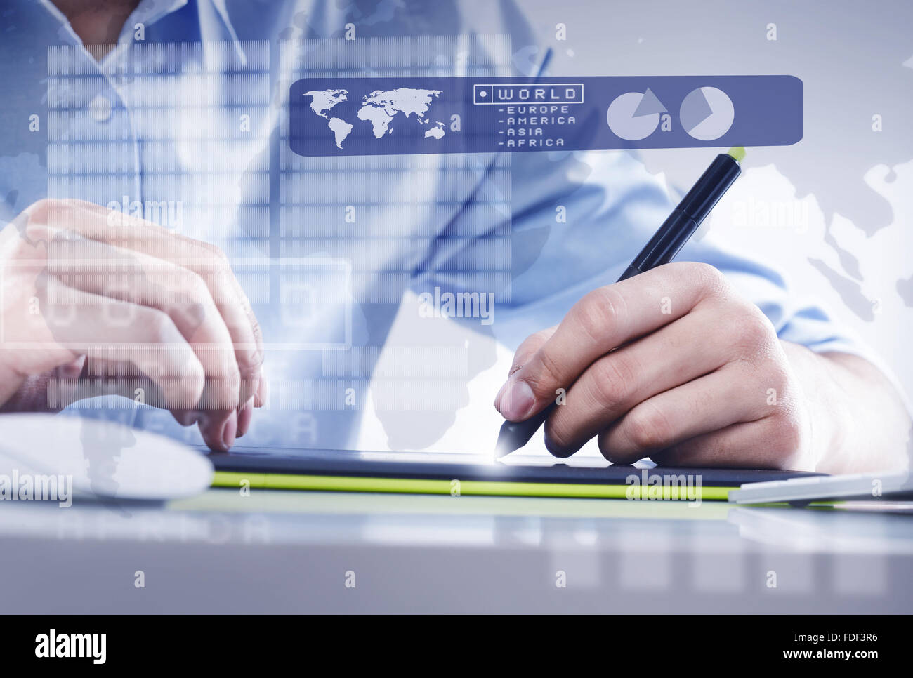 Graphic designer drawing something on tablet at office Stock Photo - Alamy
