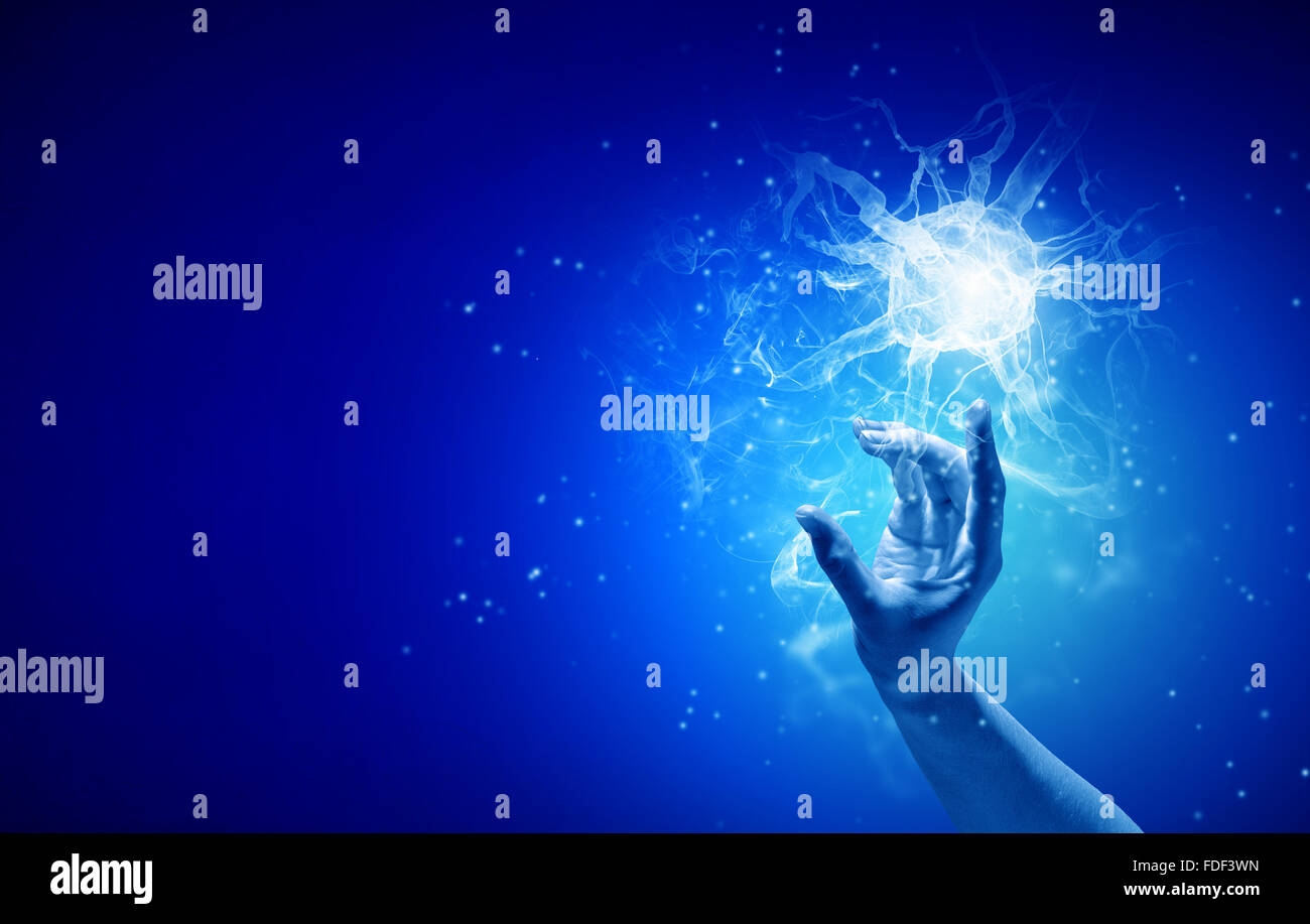 Close up of man hand touching nerve symbol on blue background Stock ...