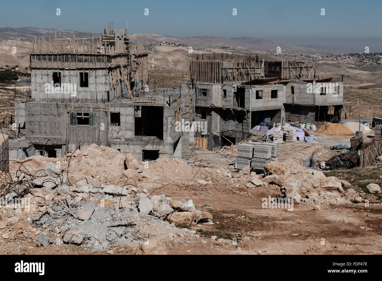 Maale Adumim, Israel. 31st January, 2016. Construction workers labor on ...