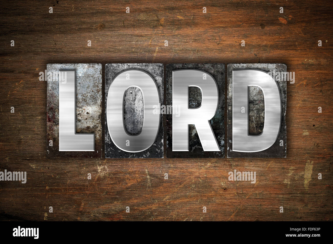 The word "Lord" written in vintage metal letterpress type on an aged ...