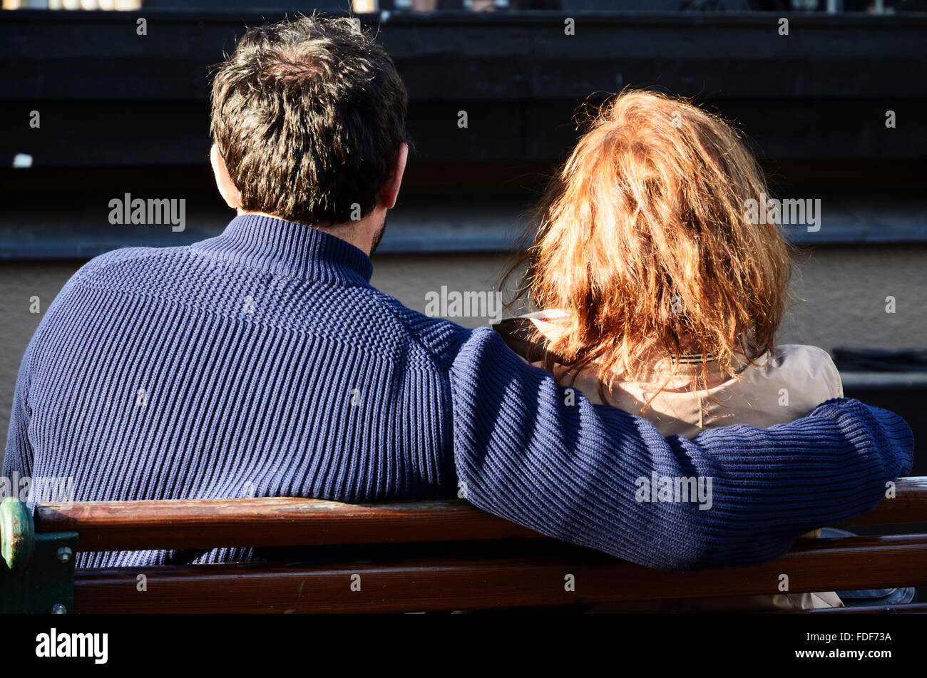 Couple sitting. Esplanade Park, Helsinki, Finland Stock Photo - Alamy