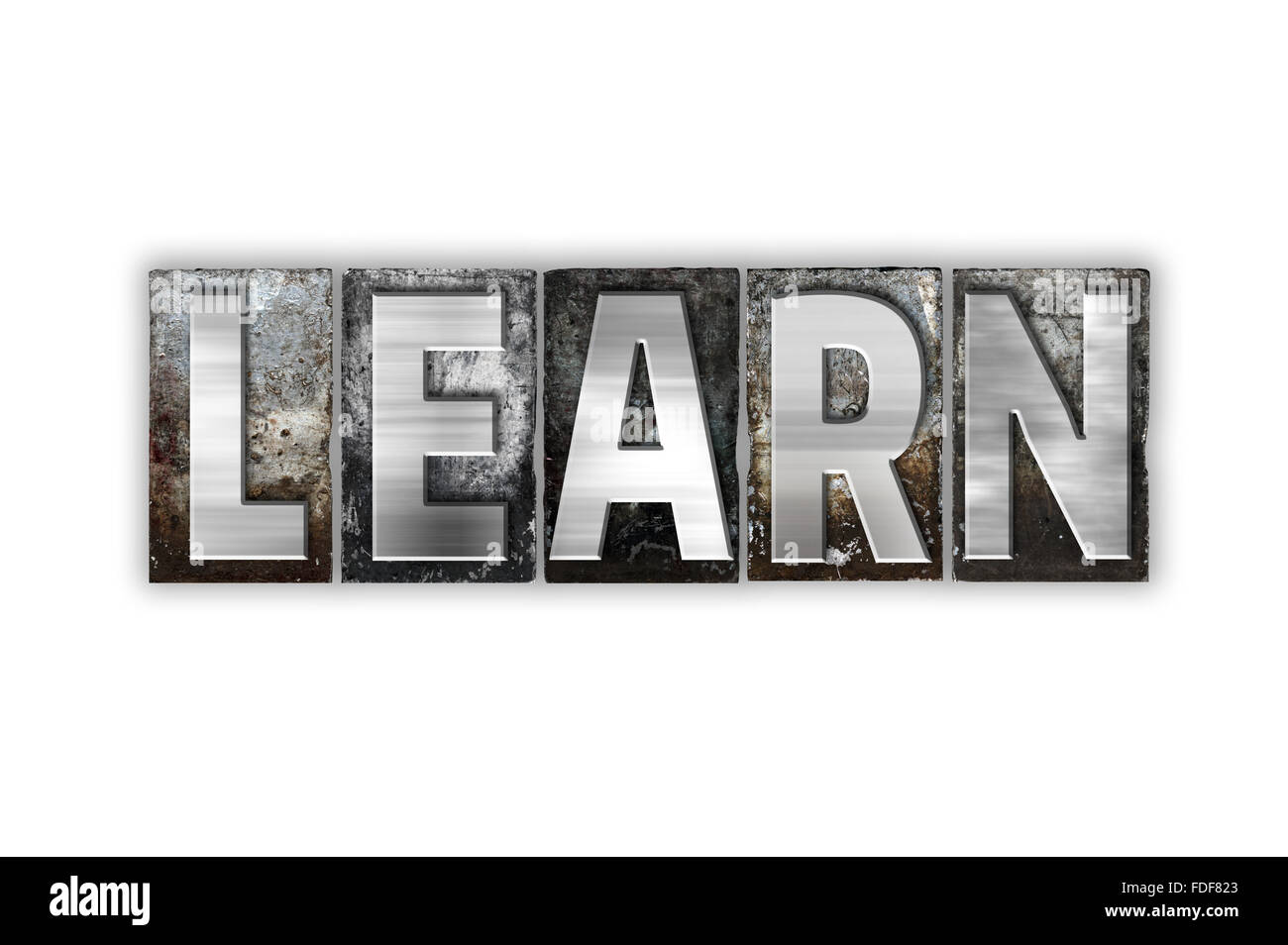 The word "Learn" written in vintage metal letterpress type isolated on ...