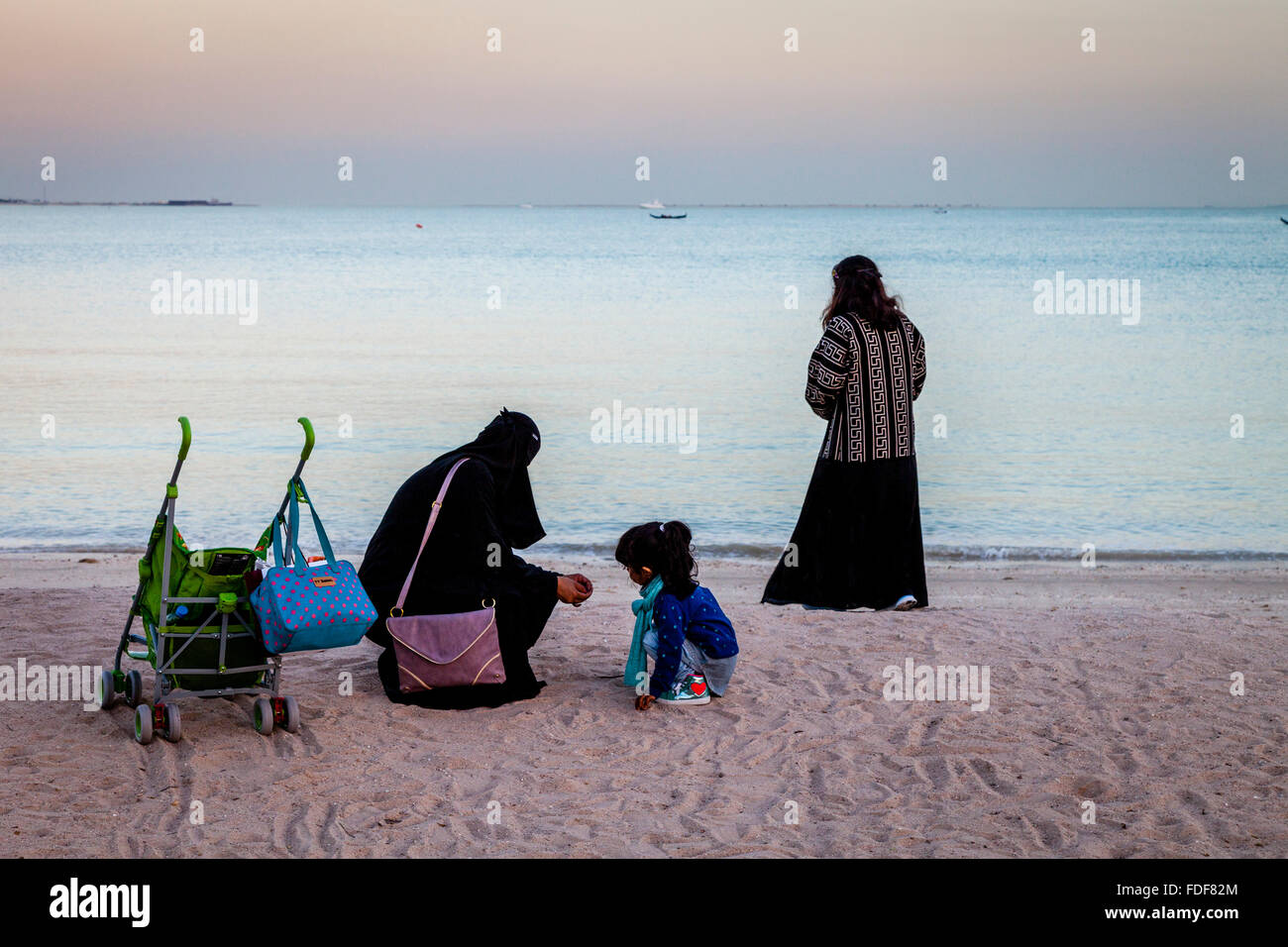 Burqas on the beach hi-res stock photography and images - Alamy