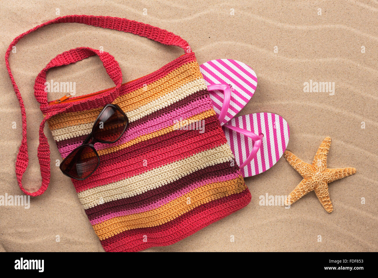 Beach bag with flip flops, sunglasses and starfish. Summer holiday ...