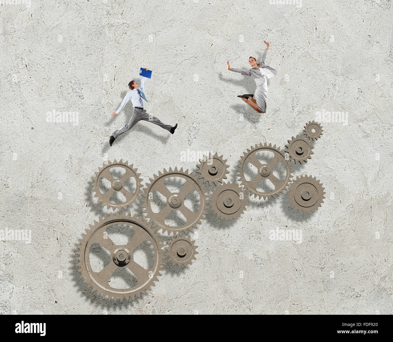 Businessman and businesswoman with cog wheel elements. Organization ...