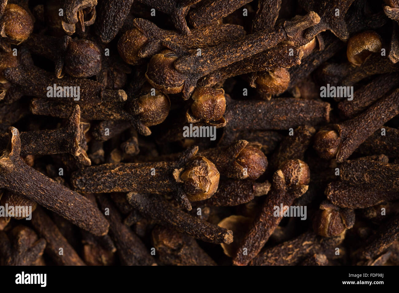 Cloves spice close up as a background Stock Photo - Alamy