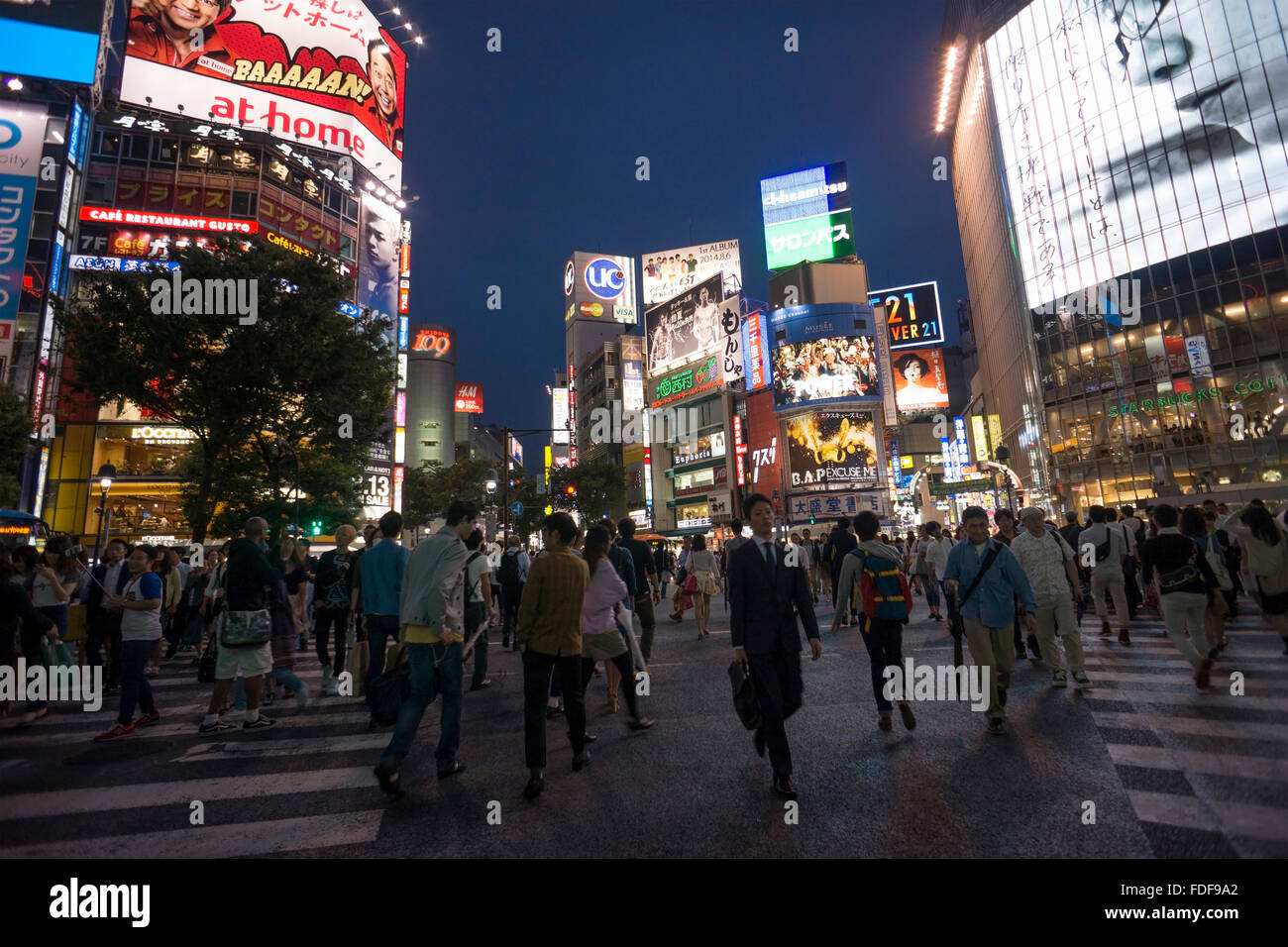 TOKYO - August 28, 2014. People crossing the famous intersection ...