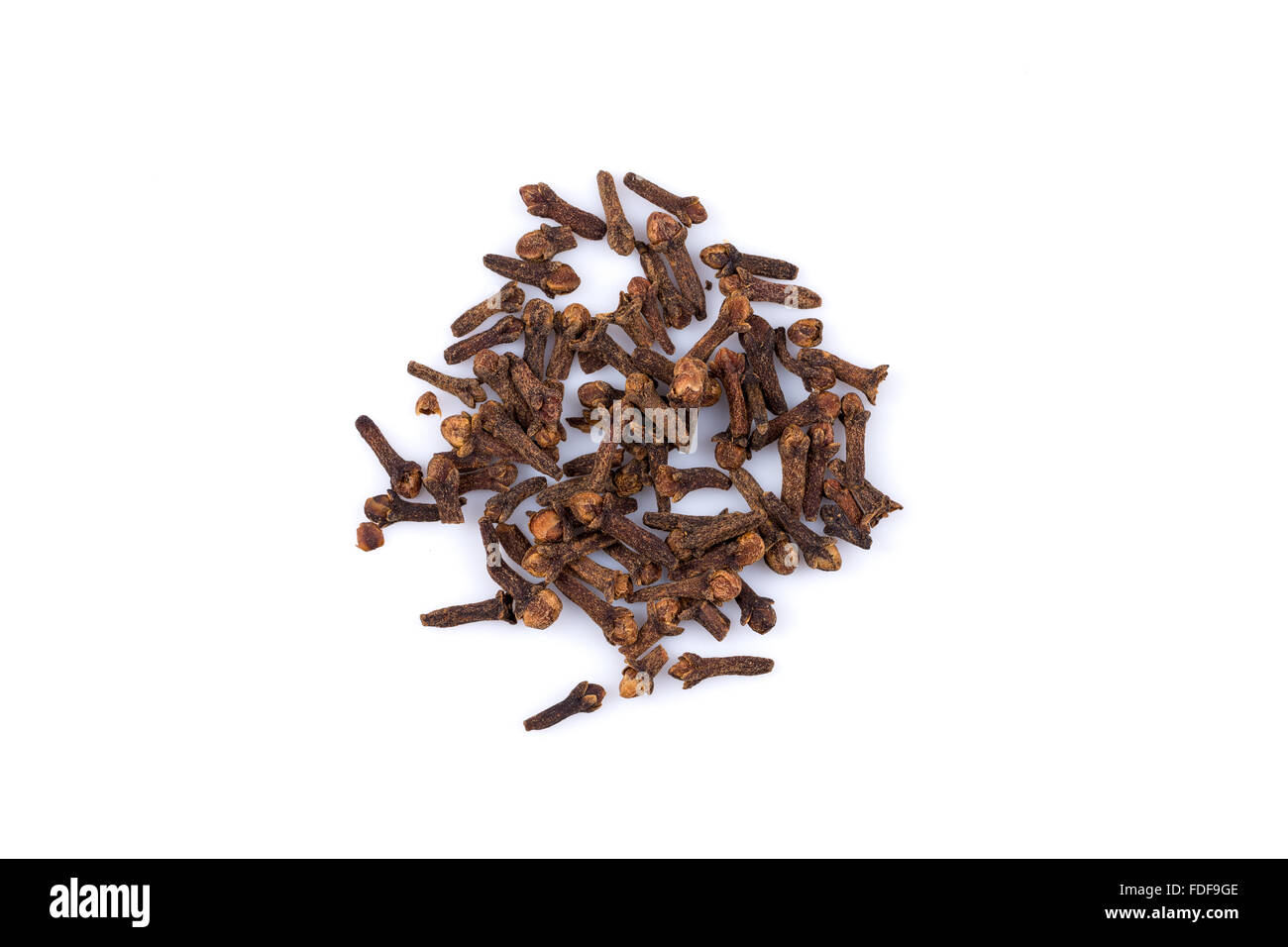 Cloves spice pile isolated on a white background Stock Photo - Alamy