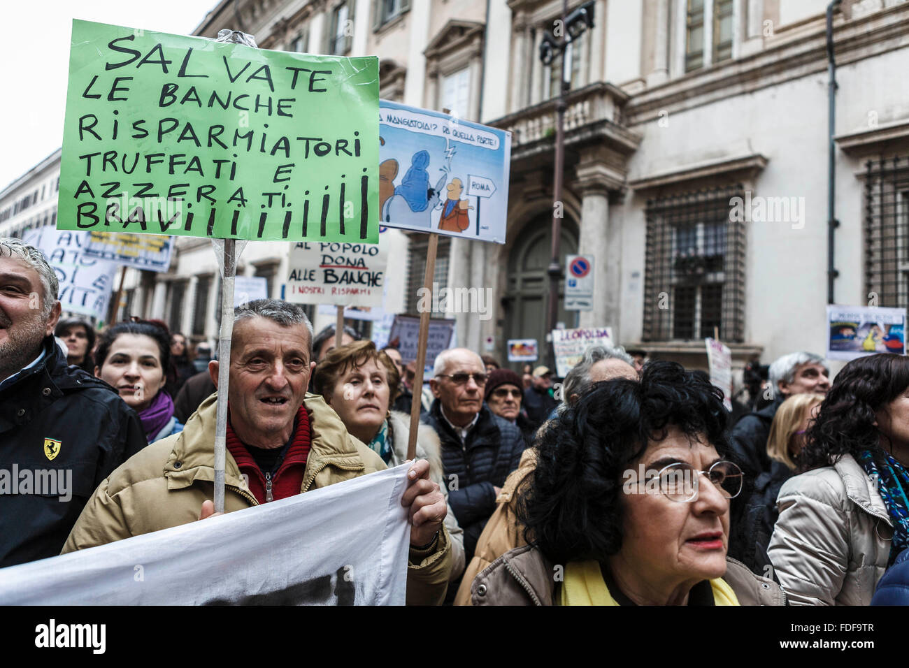 Rome, Italy. 31st Jan, 2016. Protesters shout slogans and hold banners ...