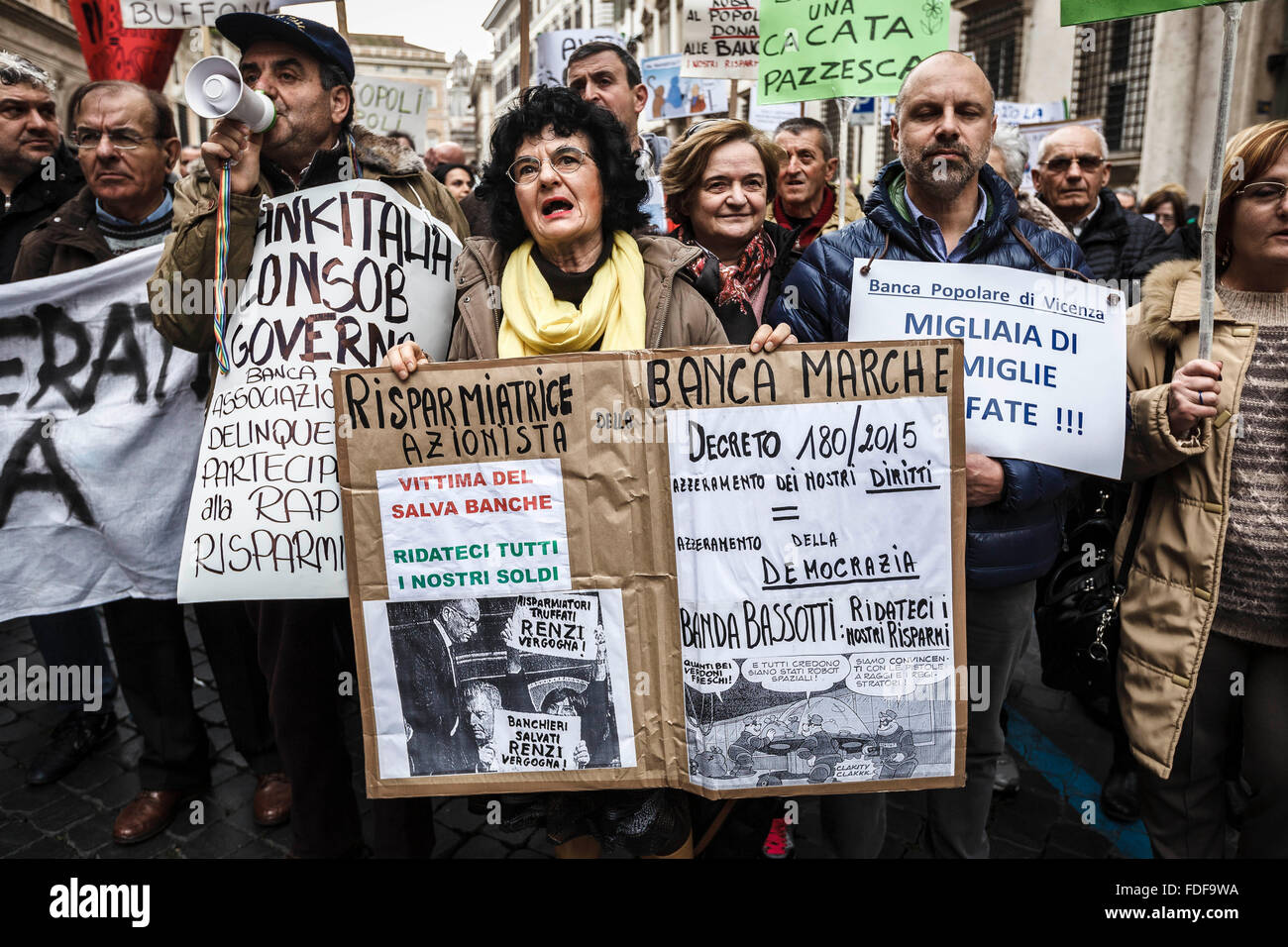 Rome, Italy. 31st Jan, 2016. Protesters shout slogans and hold banners ...