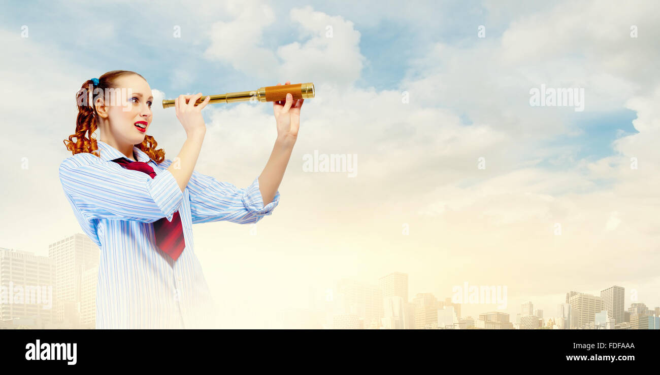 Image of young pretty woman looking in telescope Stock Photo - Alamy