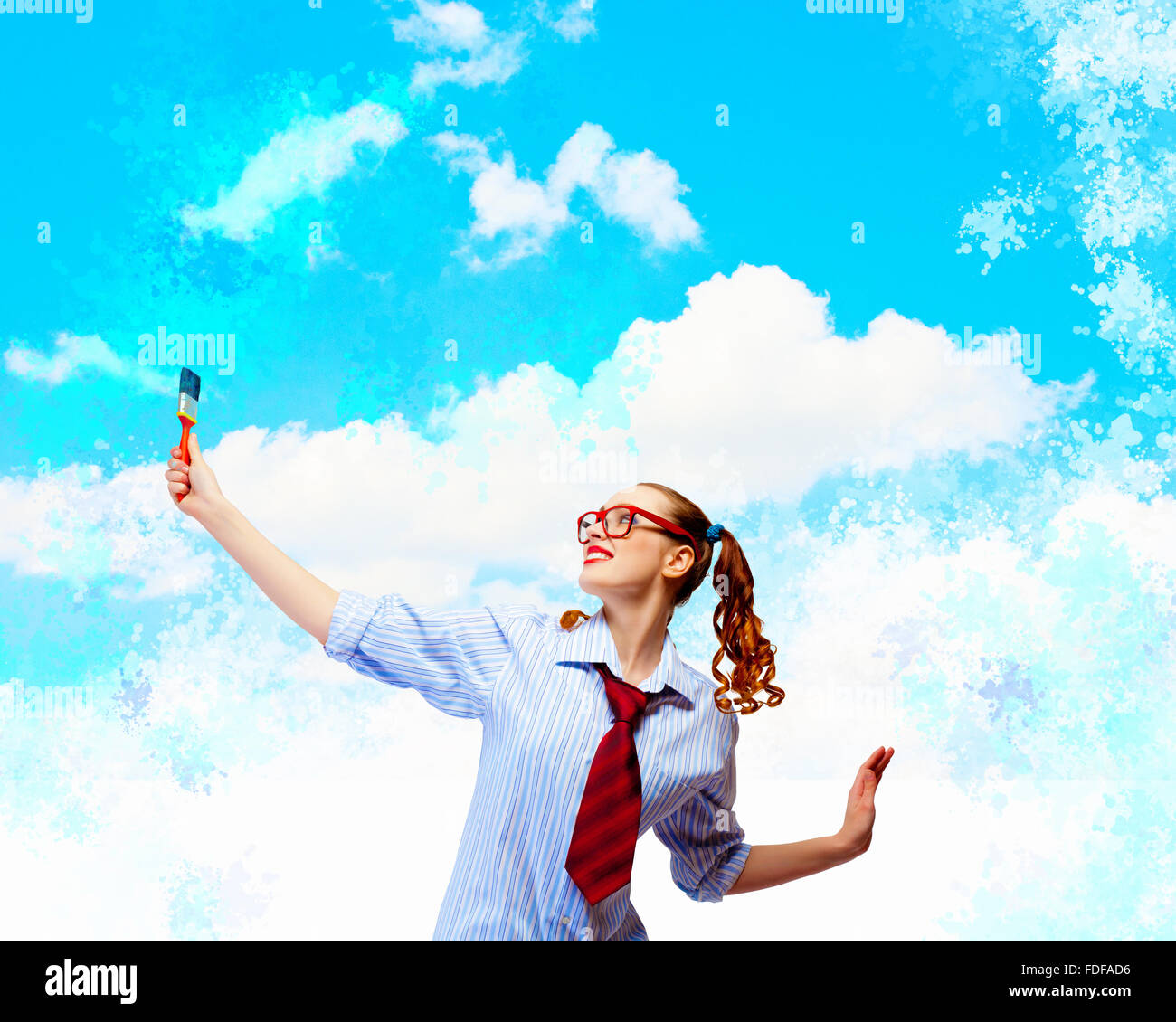 Image of young woman painter with brush Stock Photo - Alamy