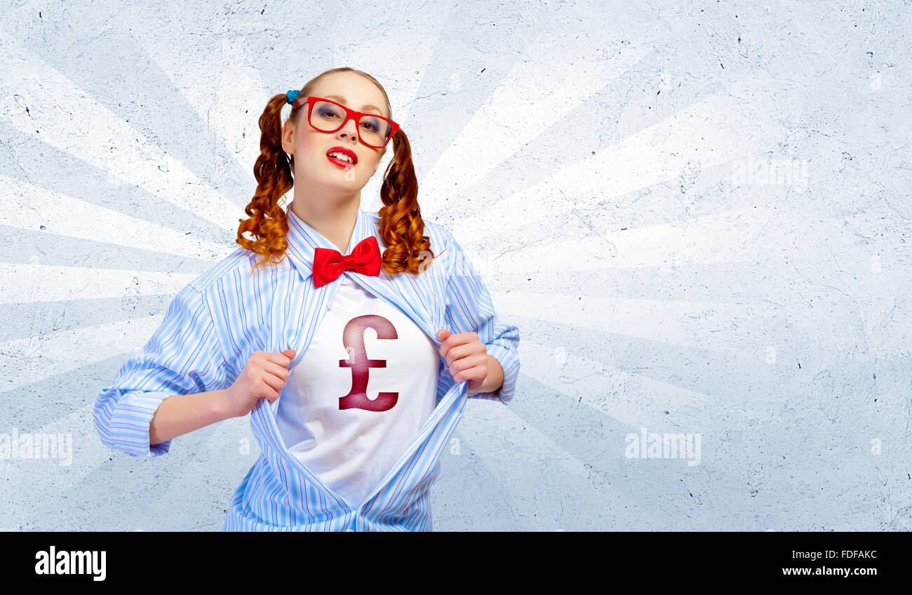 Young woman acting like super hero with pound sign on chest Stock Photo ...