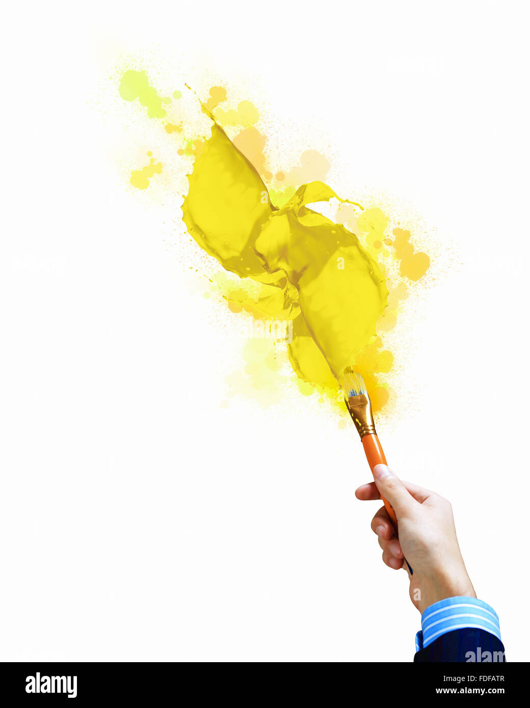Close-up of human hand holding paint brush making colorful paint ...