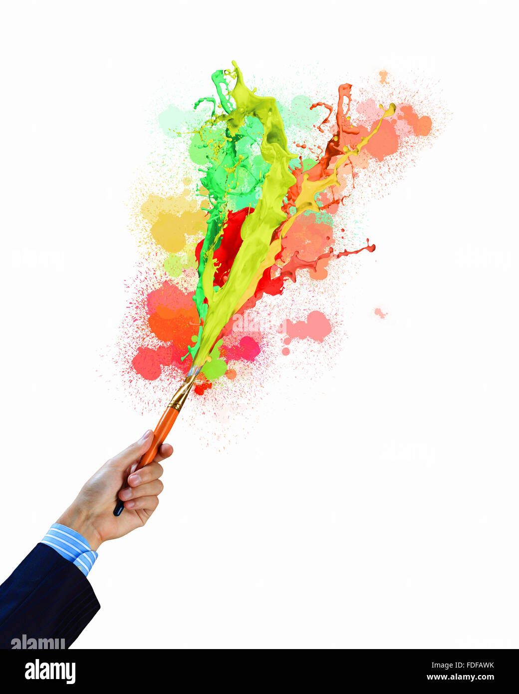 Close-up of human hand holding paint brush making colorful paint ...