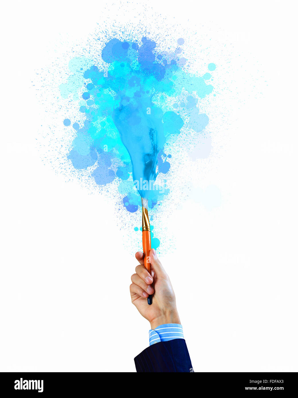 Close-up of human hand holding paint brush making colorful paint ...