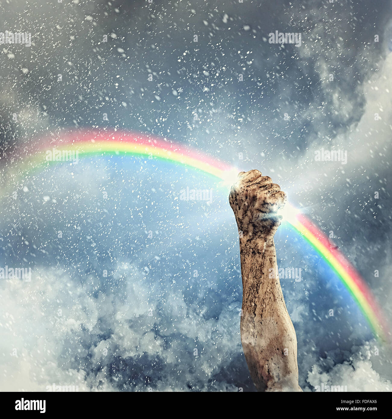 Close-up image of human hand clenching rainbow Stock Photo - Alamy