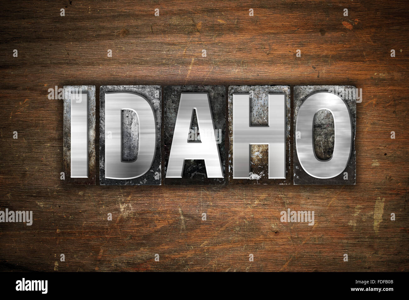 The word "Idaho" written in vintage metal letterpress type on an aged ...