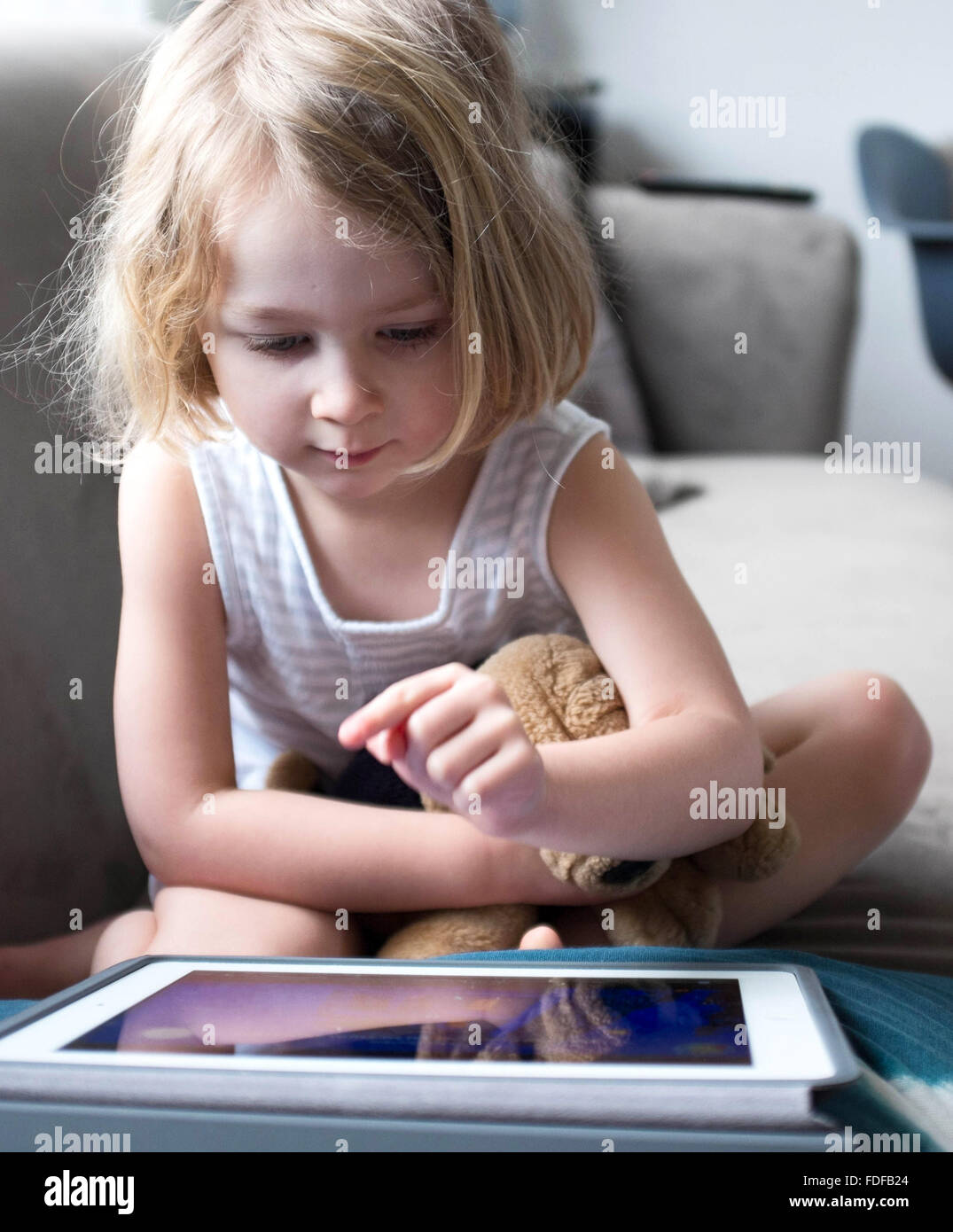 Touching ipad screen hi-res stock photography and images - Alamy