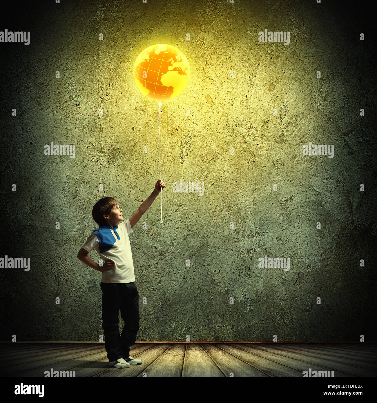 Image of little cute boy with globe balloon Stock Photo - Alamy