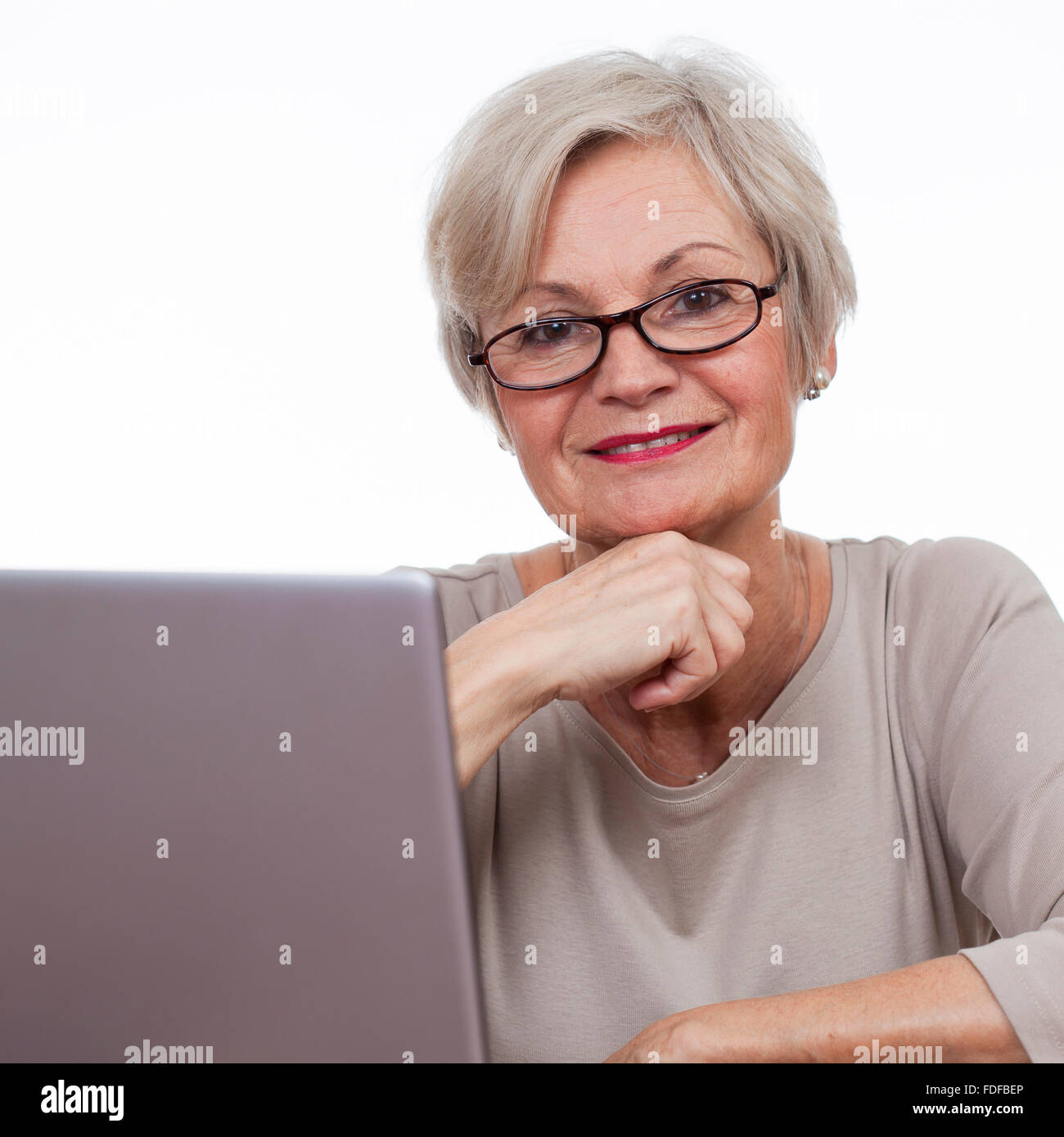 old senior woman surfing internet using laptop Stock Photo - Alamy