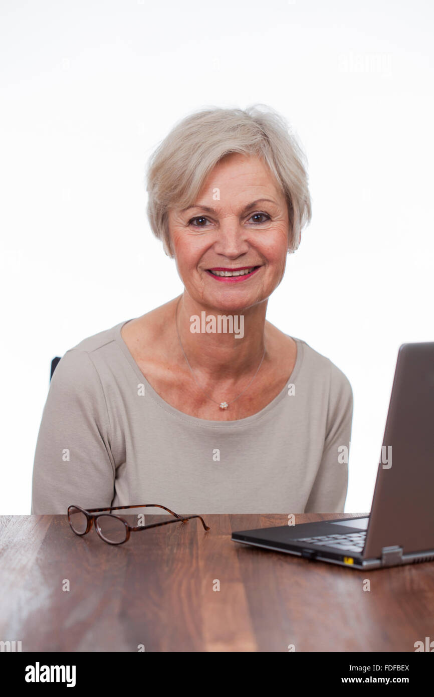 old senior woman surfing internet using laptop Stock Photo - Alamy