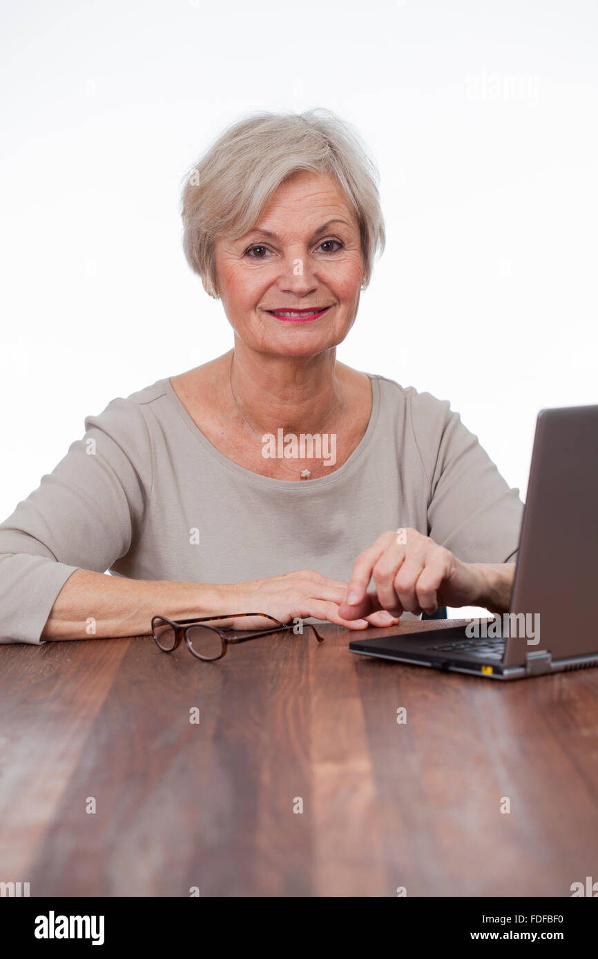 old senior woman surfing internet using laptop Stock Photo - Alamy