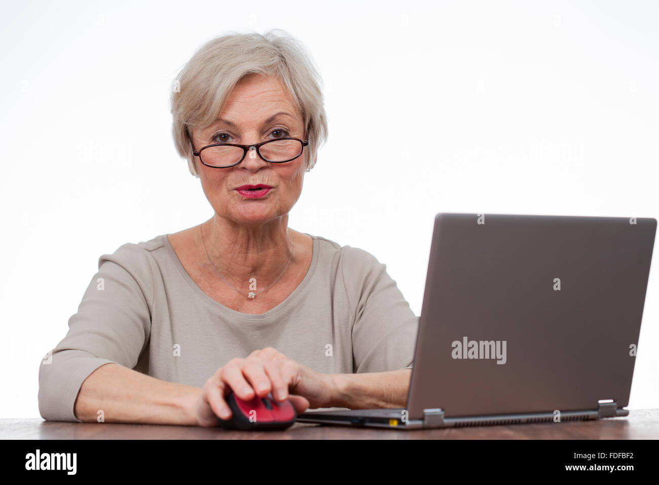 old senior woman surfing internet using laptop Stock Photo - Alamy