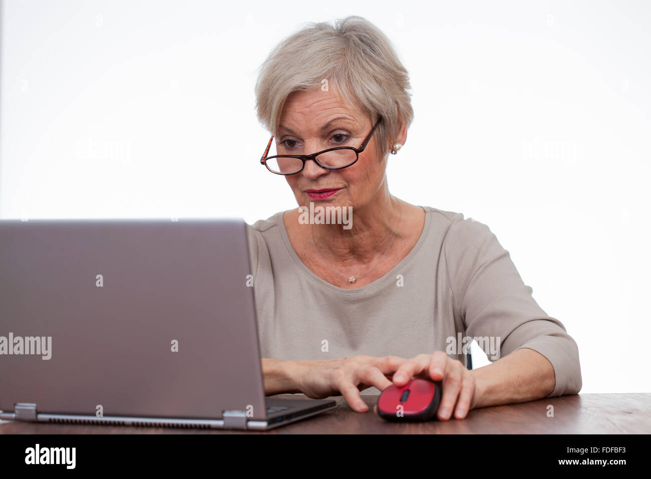 Female senior laptop isolated hi-res stock photography and images - Alamy