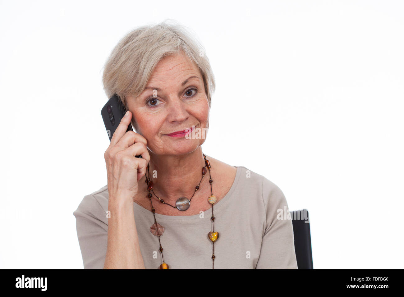 older happy senior women using smart phone answering call Stock Photo ...