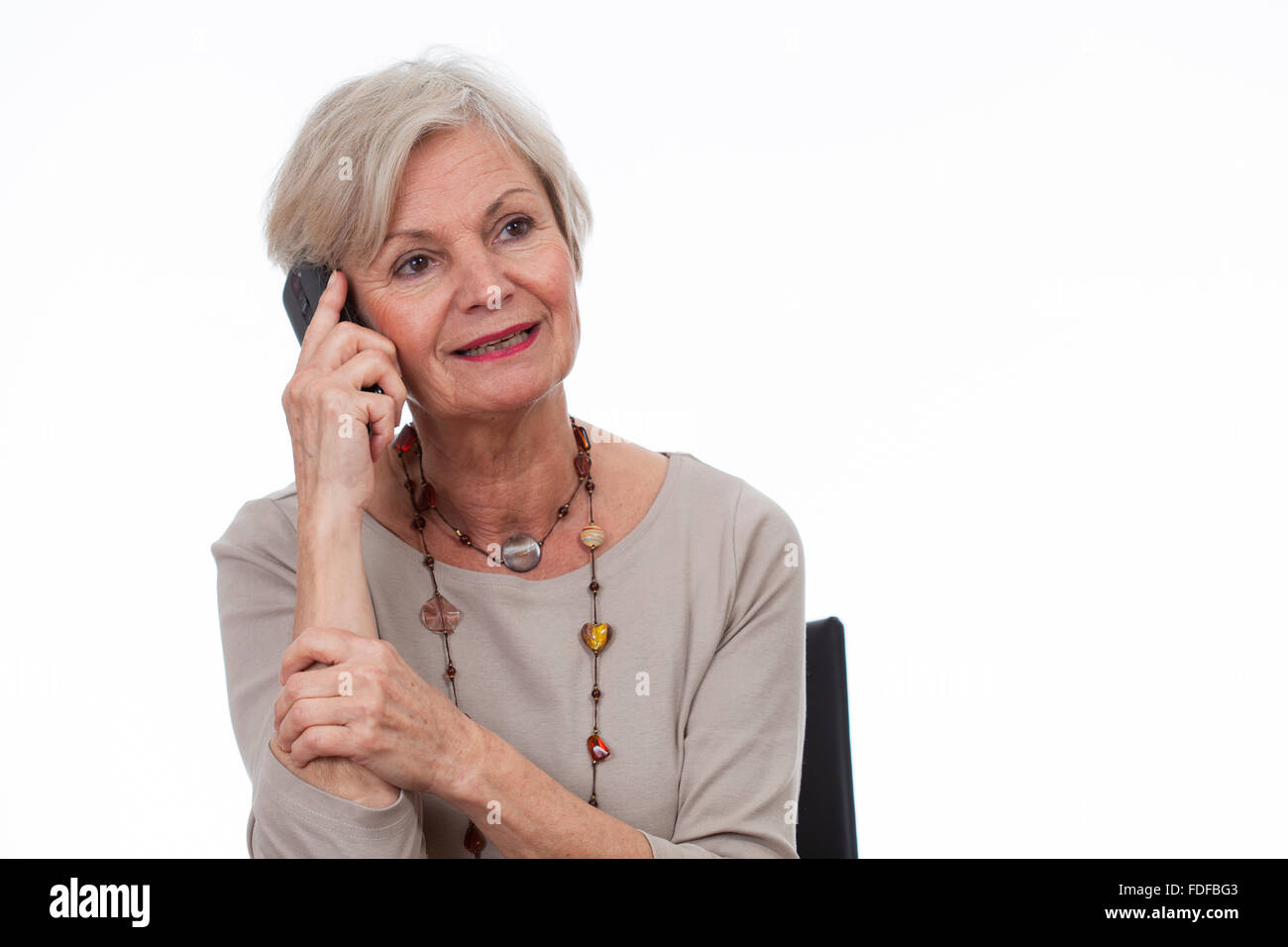 older happy senior women using smart phone answering call Stock Photo ...