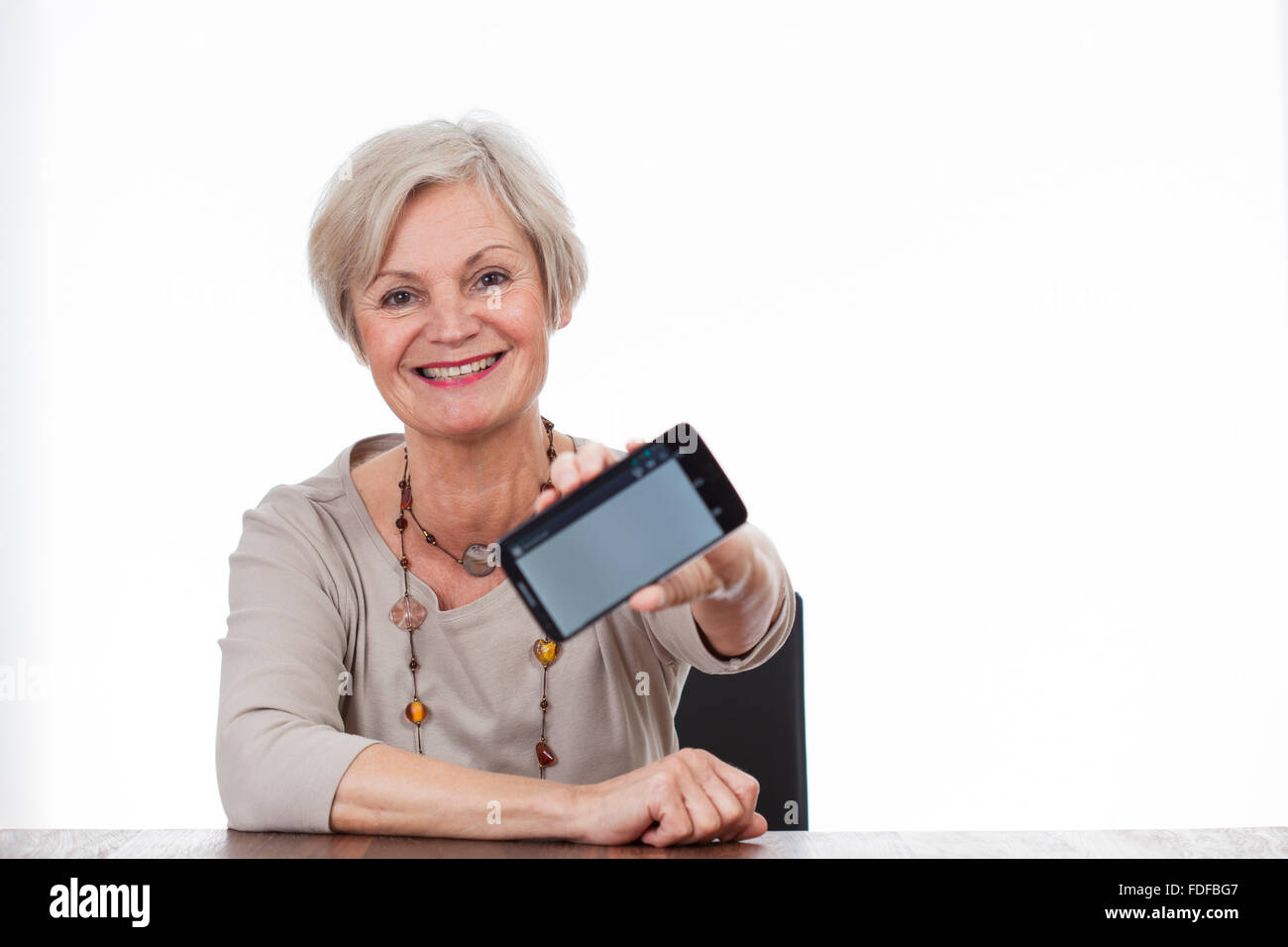 older happy senior women using smart phone answering call Stock Photo ...