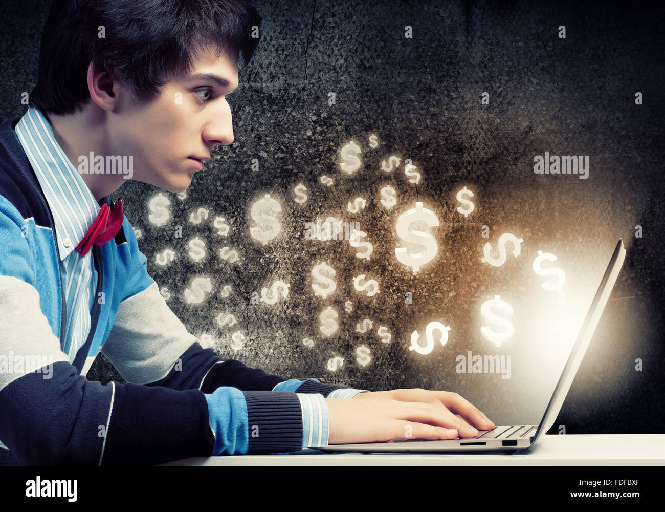 Image of young businessman at work using laptop Stock Photo - Alamy