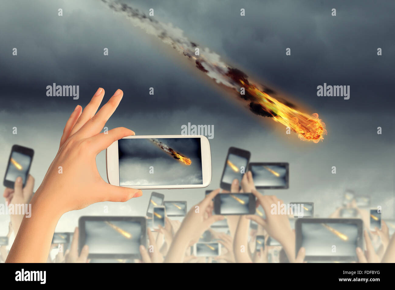 Close up of human hands taking photo of falling meteorite Stock Photo ...
